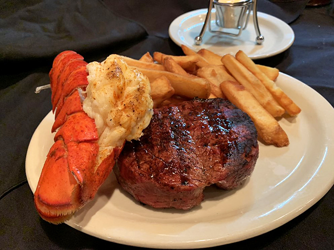 Surf meets turf in glorious harmony &ndash; that lobster tail looks ready for its close-up, Mr. DeMille.