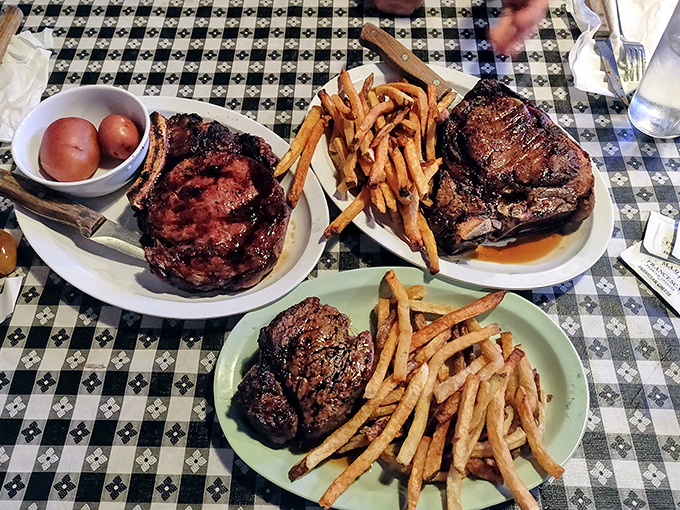 The holy trinity of dining: perfectly seared steaks, golden fries, and the promise that you'll need to unbutton your pants before dessert.