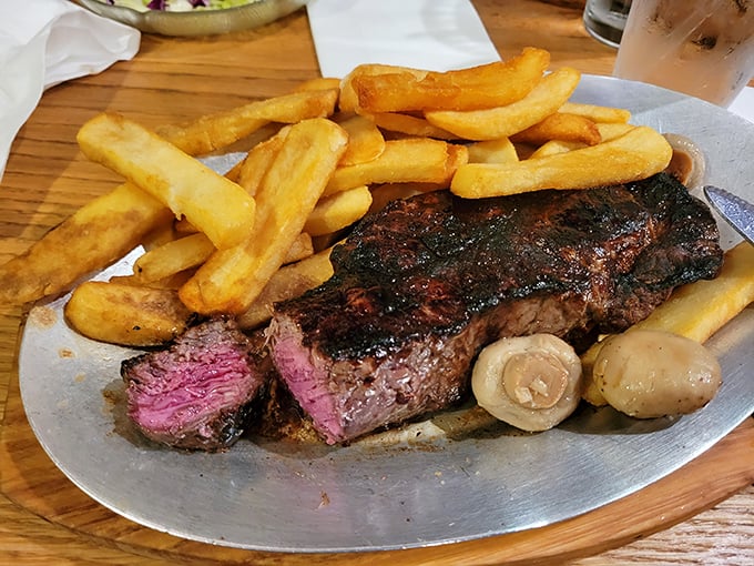 This isn't just a steak; it's a masterpiece of meat artistry, where the pink center and charred exterior create a perfect harmony of flavors.