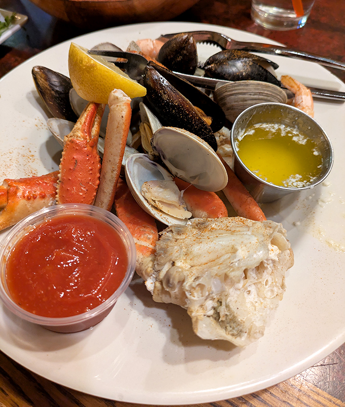 This steamed seafood sampler brings the entire Atlantic coast to your table—mussels, clams, crab legs, and shrimp with melted butter.