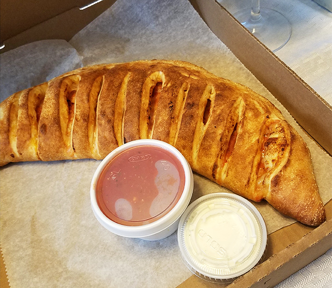 Behold the legendary stromboli in its natural habitat&mdash;golden, glistening, and ready to make your taste buds write thank-you notes.