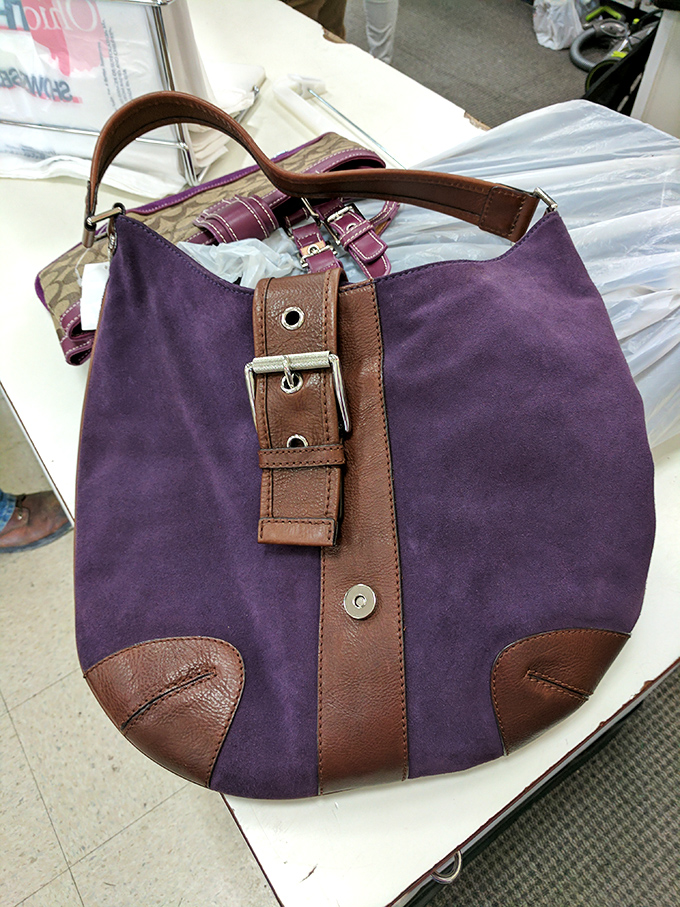 This purple suede handbag didn't end up here by accident&mdash;someone paid good money for this once. Their loss is your stylish, budget-friendly gain.