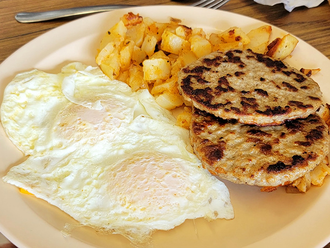 Perfectly fried eggs with that golden-crisp edge, home fries with just the right crunch, and scrapple that would make any Delawarean proud.