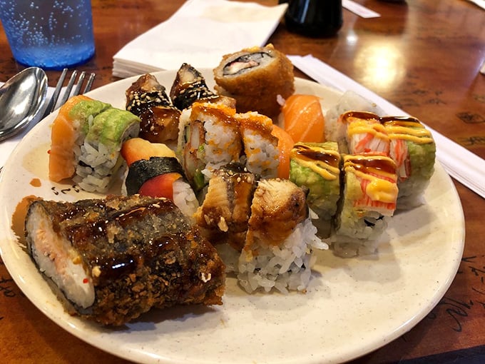 A plate of sushi that looks like it should be in an art gallery. Each piece a colorful promise that buffets and quality can indeed coexist harmoniously.