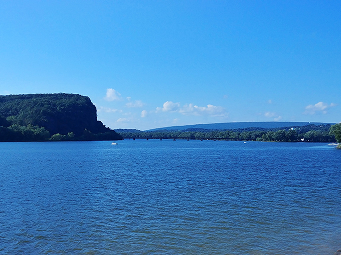 The mighty Susquehanna River flows past dramatic cliffs, offering Sunbury residents a daily dose of natural splendor that elsewhere would command premium prices.