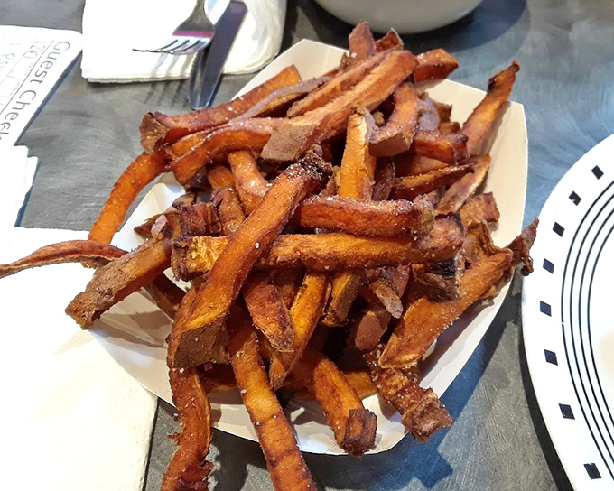 These aren't just sweet potato fries&mdash;they're what regular fries dream about becoming when they grow up. Crispy, caramelized edges giving way to pillowy centers.