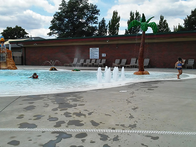 Summer salvation comes in the form of Lincoln's community pool, complete with palm tree fountain. Who needs the Caribbean when paradise is just down the street?