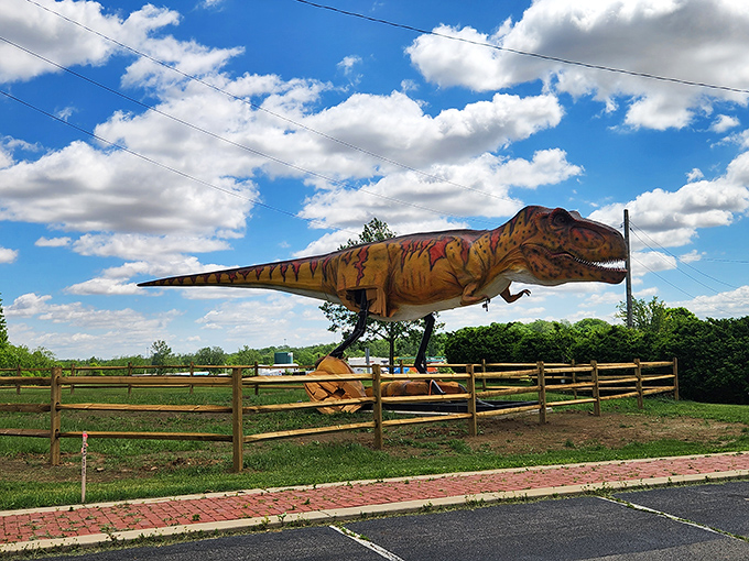 "I promise not to eat the tourists!" This T-Rex stands guard outside Uranus, proving dinosaurs and planetary puns make perfect roadside companions.