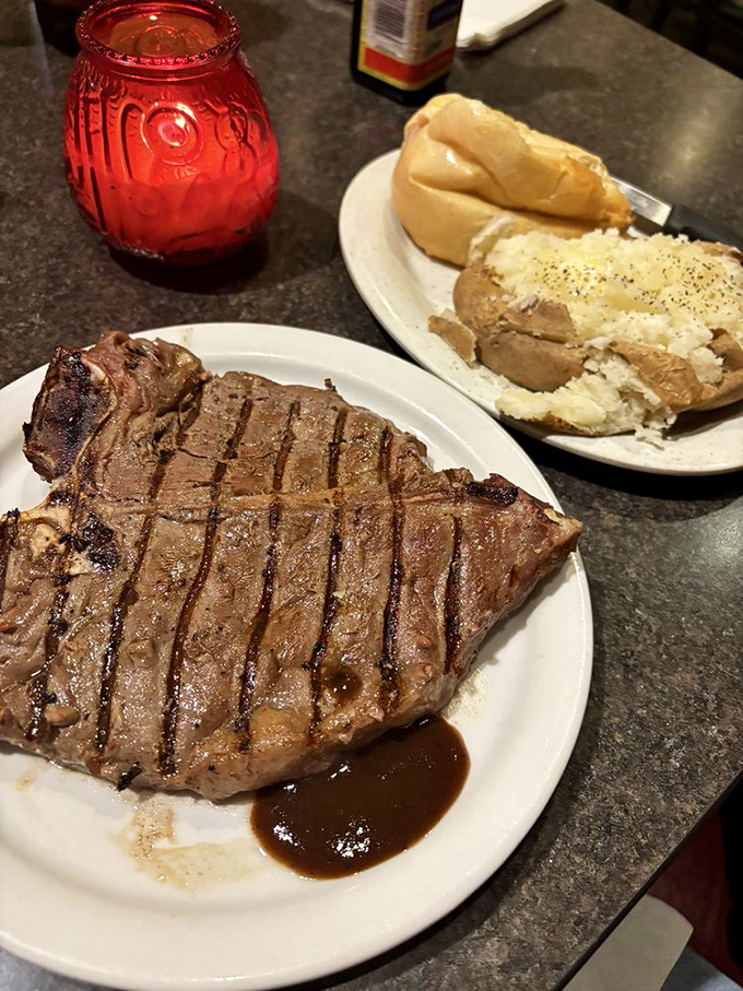 This T-bone doesn't need filters or fancy plating&mdash;just a white plate, a puddle of jus, and a baked potato standing by like a faithful sidekick.