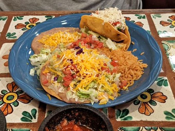 The legendary taco-enchilada combo &ndash; where crispy meets saucy in a flavor marriage that would make even the most jaded foodie weep with joy.