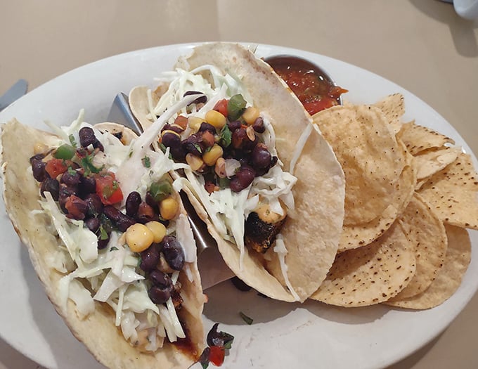 These aren't your average tacos! Loaded with black beans, corn, and fresh slaw, they're Wisconsin's delicious answer to the question "where should we eat?"