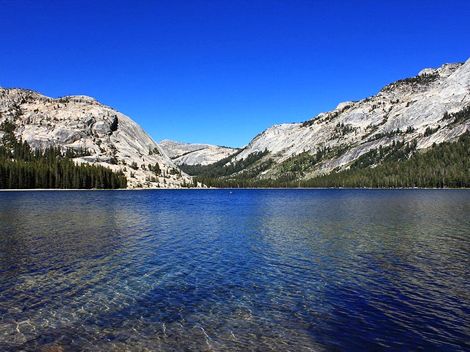 Tenaya Lake&mdash;nature's infinity pool. The water so clear you can count pebbles on the bottom while granite domes stand guard like ancient sentinels.