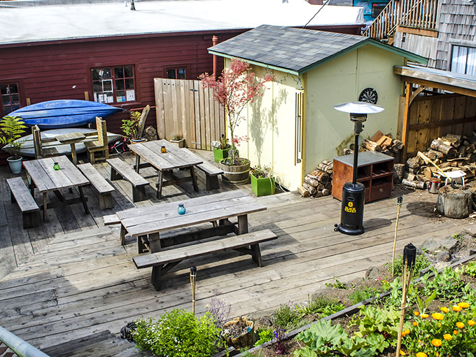 Outdoor dining that doesn't just serve food—it serves perspective. These wooden tables have witnessed more meaningful conversations than most therapists.
