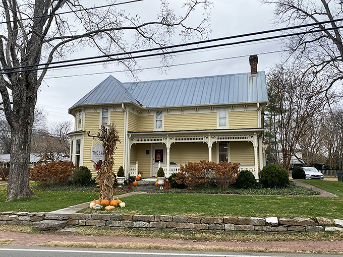 This sunny yellow Victorian home with seasonal pumpkin display perfectly captures Leiper's Fork's blend of historic preservation and down-home hospitality.
