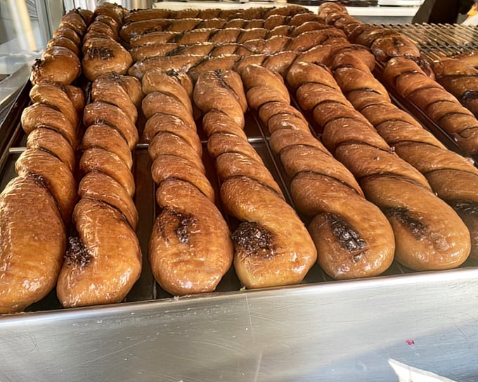 Tiger Tails lined up like edible works of art&mdash;twisted, glazed, and glistening with a promise that calories consumed on vacation don't count.