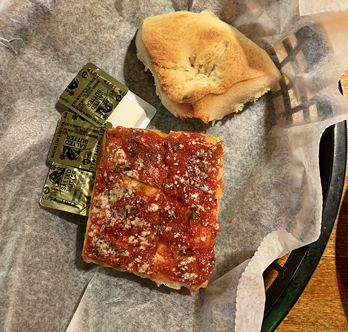 Old-school tomato pie that would make your Italian grandmother weep with joy. Simple, unapologetic, and exactly what pizza was meant to be.