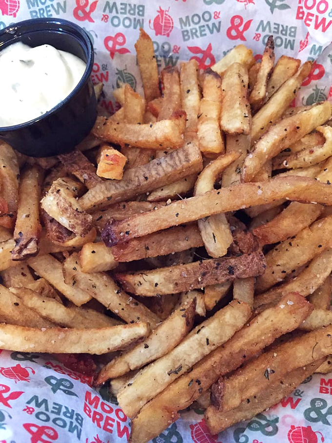 These aren't just fries; they're crispy golden vessels for delivering rosemary-infused truffle goodness directly to your happiness receptors.