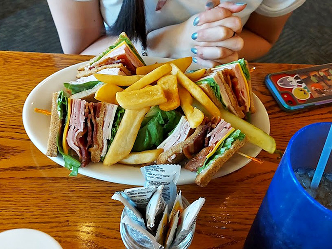 Behold the legendary Turkey Club&mdash;architectural marvel, flavor symphony, and the reason some folks drive across three counties just for lunch.