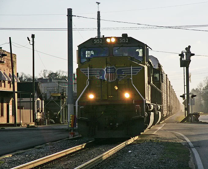 Trains still rumble through downtown, a nostalgic reminder of simpler times when retirement meant rocking chairs, not rocking investment portfolios.