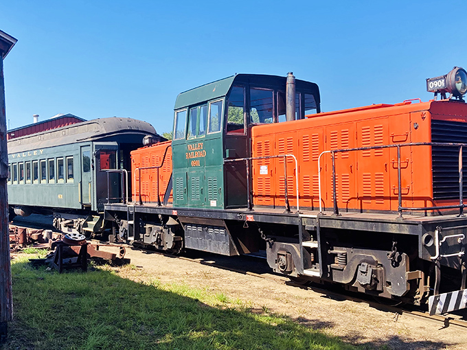 This bright orange diesel locomotive might not have the romance of steam, but what it lacks in puffiness it makes up for in bold, industrial charm.