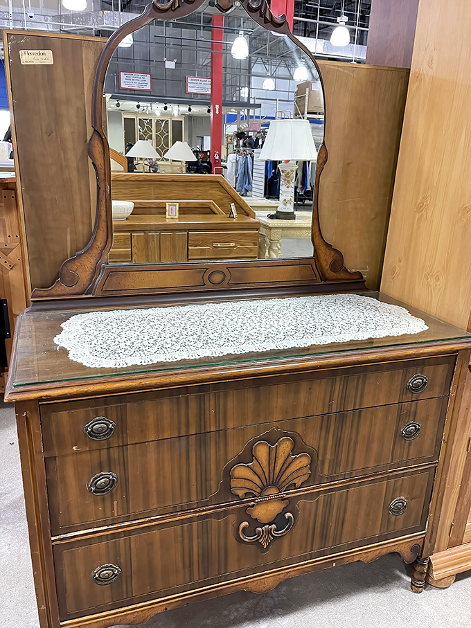 This vintage vanity isn't just furniture; it's a time machine to an era when getting ready was an event worthy of beautiful craftsmanship.