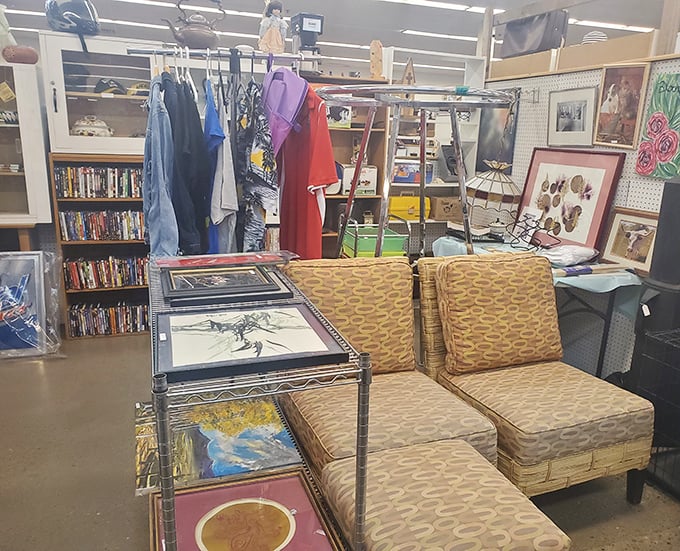 Mid-century furniture meets vintage art in this booth &ndash; where your next living room conversation piece is hiding in plain sight.