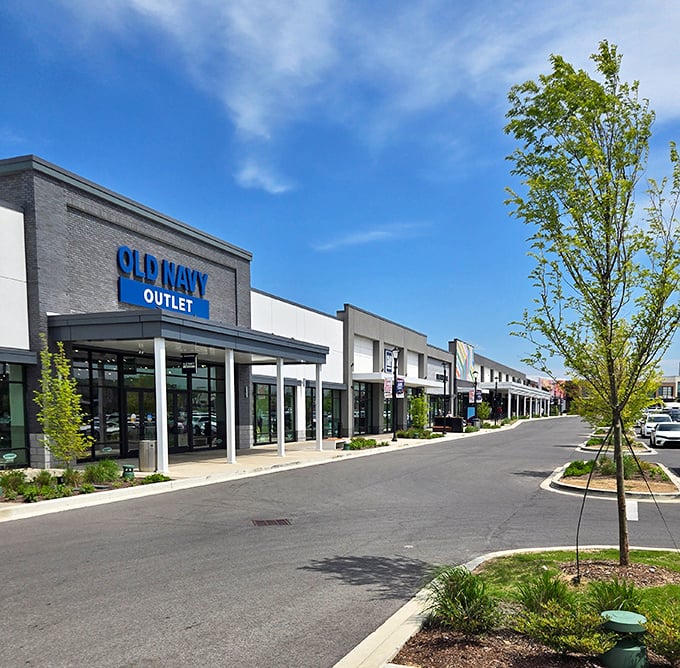 Old Navy leads the charge down a row of storefronts that promise fashion without financial ruin. Clean lines and ample parking sweeten the deal.