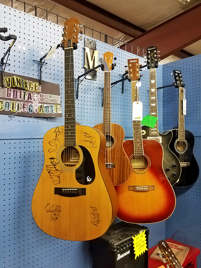 Vintage guitars hang like trophies of musical history. That autographed acoustic has stories to tell – if only its strings could talk.