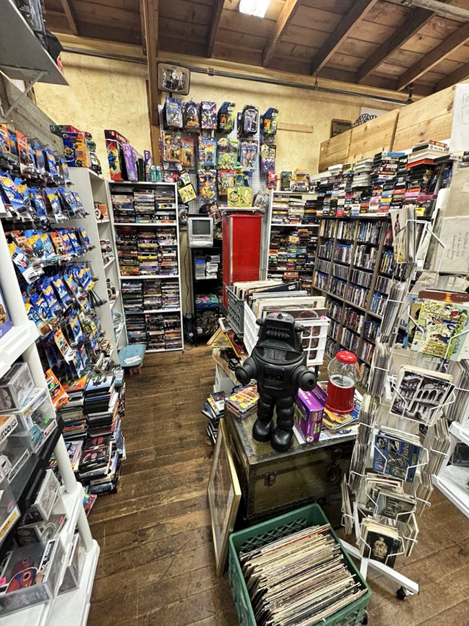 VHS tapes, action figures, and a robot guard standing watch. This booth is where your childhood goes to be rediscovered and properly appreciated.