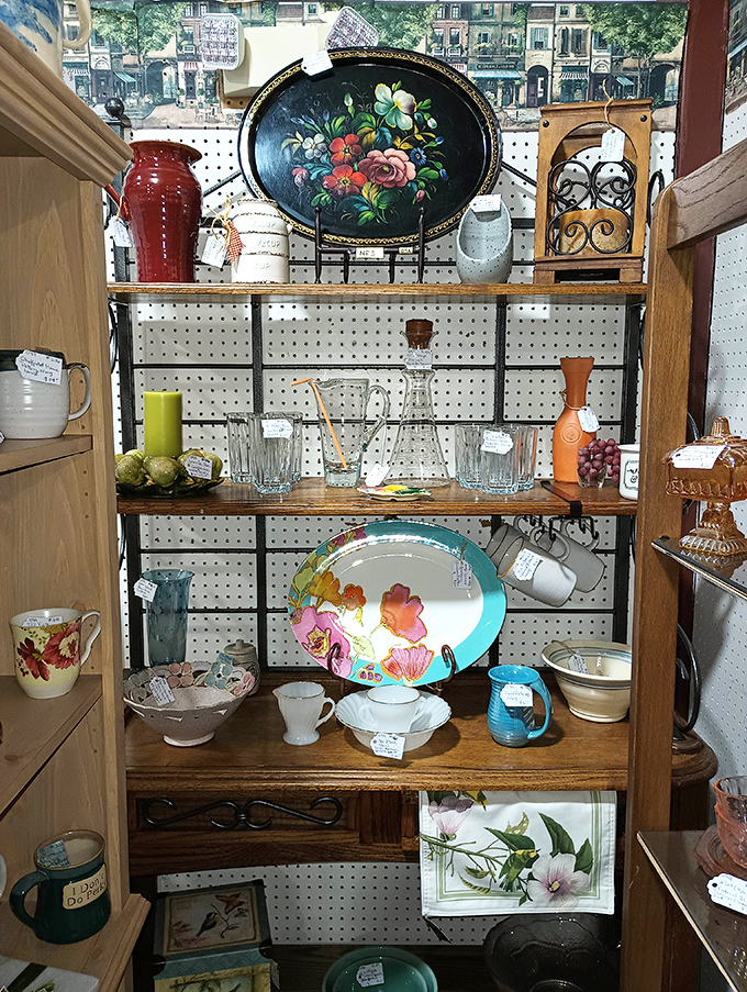 A meticulously organized chaos of dishware, where your grandmother's favorite pattern is probably hiding between hand-painted treasures and forgotten serveware.