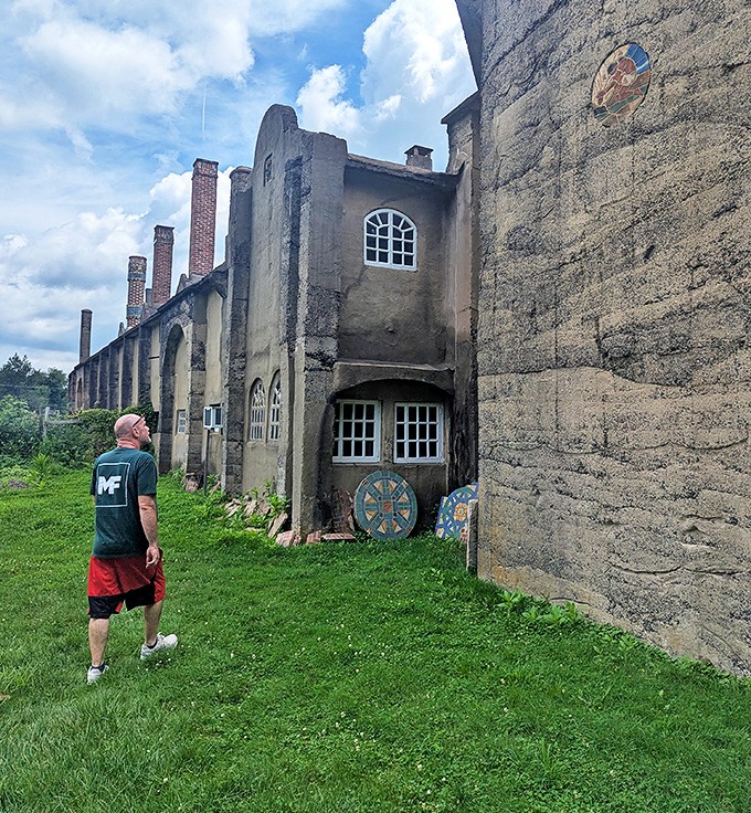 The exterior walkways reveal hidden angles of this architectural oddity that keeps visitors wonderfully disoriented.