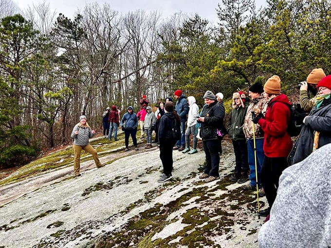 Guided tours bring the park's geological wonders to life, as visitors gather to learn about formations millions of years in the making.