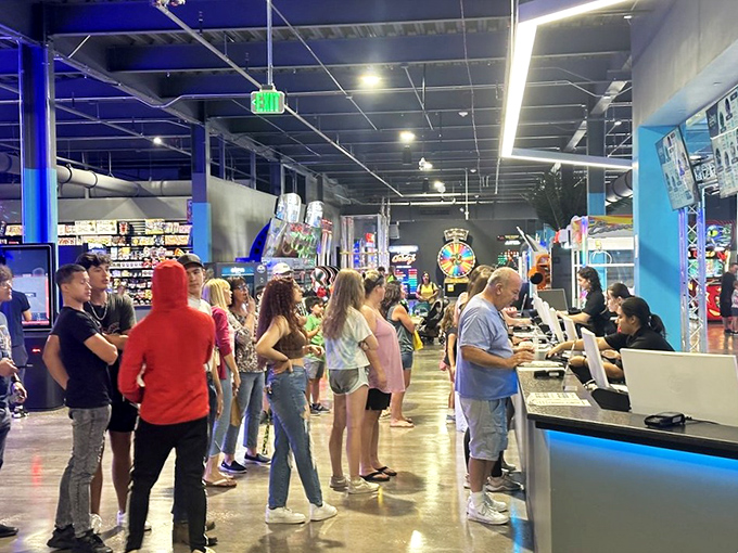 The ticket counter buzzes with anticipation as visitors line up, each face illuminated by the same childlike excitement regardless of age.