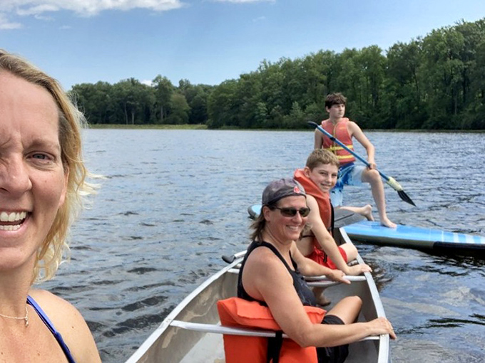 Family memories being crafted in real-time on the lake. Canoes: bringing people together and testing relationships since forever.