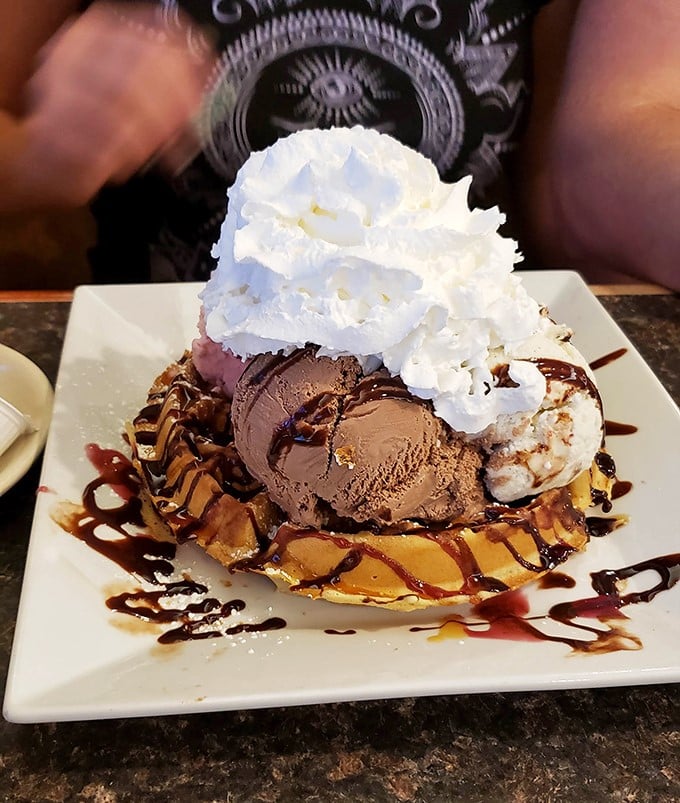 Behold the waffle sundae in all its glory &ndash; where breakfast and dessert collide in a magnificent mountain of ice cream, chocolate, and whipped cream.