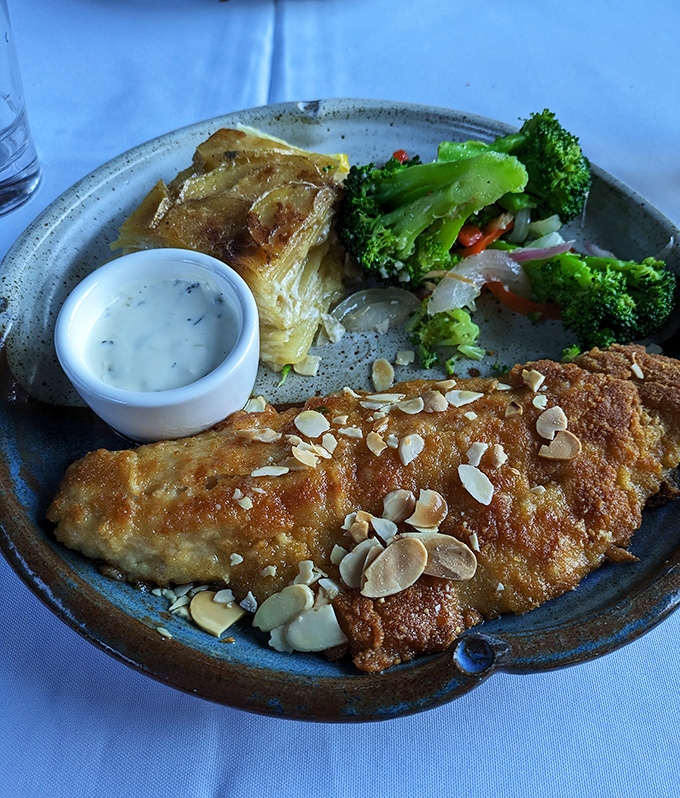 Golden-crusted walleye adorned with toasted almonds&mdash;this isn't just Minnesota's state fish, it's practically the state religion served on a plate.