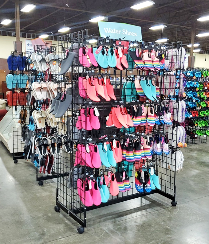 The water shoe display explodes with colors brighter than a summer popsicle stand. Who knew practical footwear could look so jubilant?