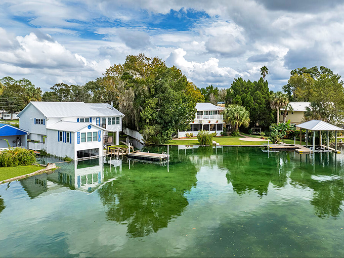 The water here isn't just clear—it's practically invisible. These canal-front homes enjoy nature's version of high-definition television right outside their windows.
