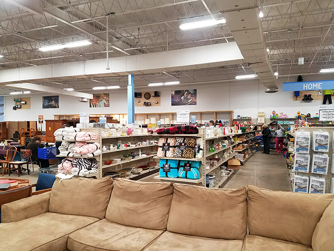Furniture paradise! That tan sofa has probably heard some stories, but at these prices, you'll gladly provide the next chapter.
