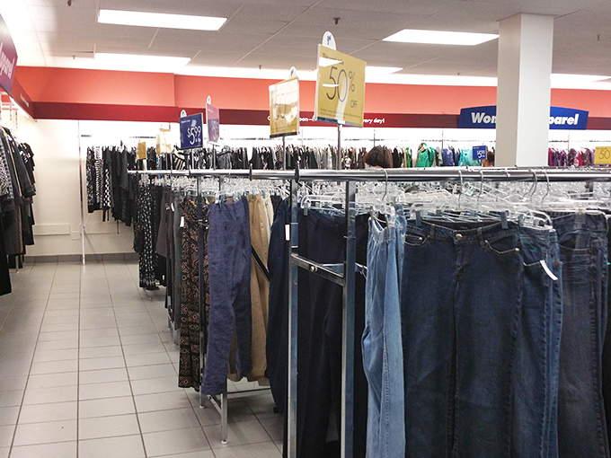 Rows of denim stretch like a blue horizon, each pair holding the promise of that perfect fit without the designer price tag.