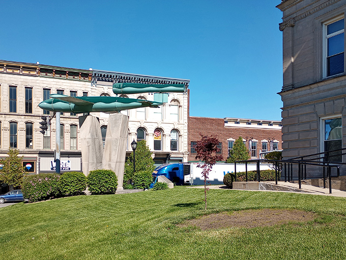 This peaceful green space offers a moment of reflection amid historic buildings, where modern life slows down just enough to appreciate the simple pleasures.