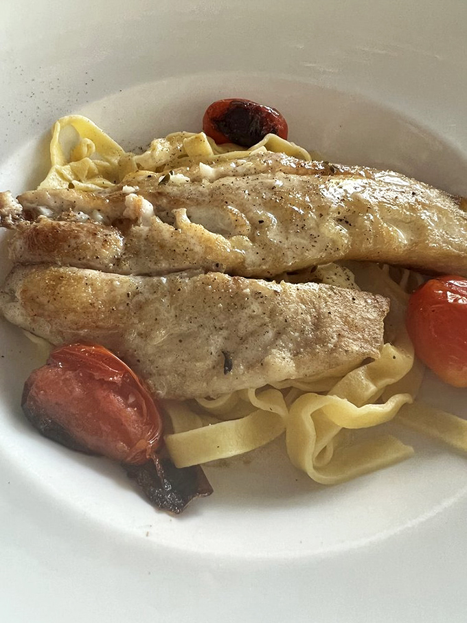 The star of the show: yellowtail snapper so fresh it practically introduces itself before melting into those perfectly al dente noodles.