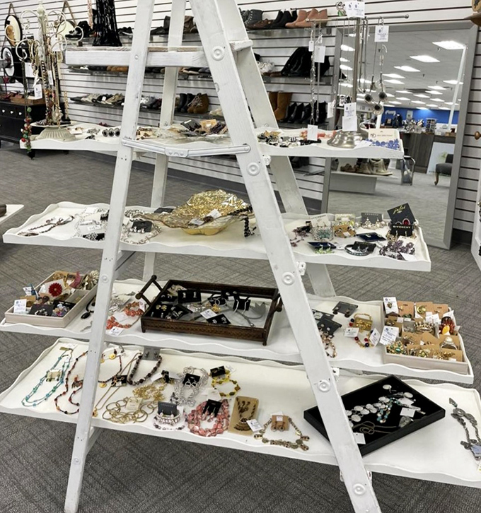 Jewelry displayed like an art installation. One person's costume castoffs become another's statement pieces in this ladder of sparkly possibilities.