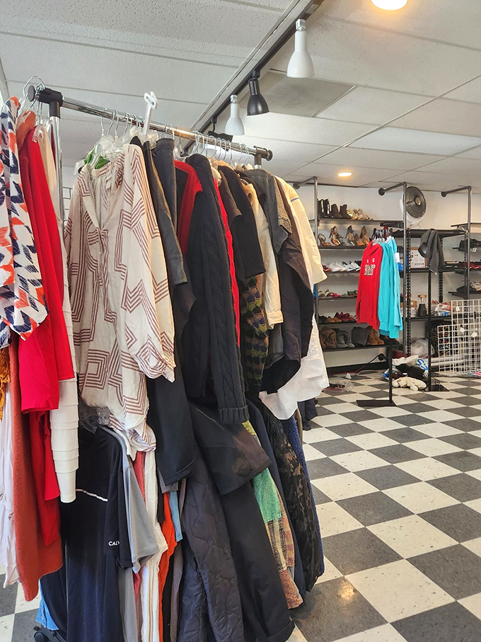 The industrial-chic clothing displays showcase everything from casual wear to outerwear, all waiting for their second act.