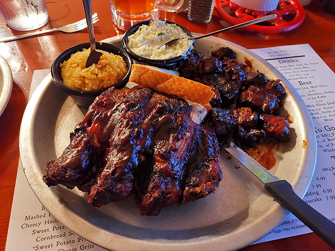 Baby back ribs with a bark so perfect it could make a tree jealous, alongside burnt ends that have clearly been introduced to fire and time in all the right ways.