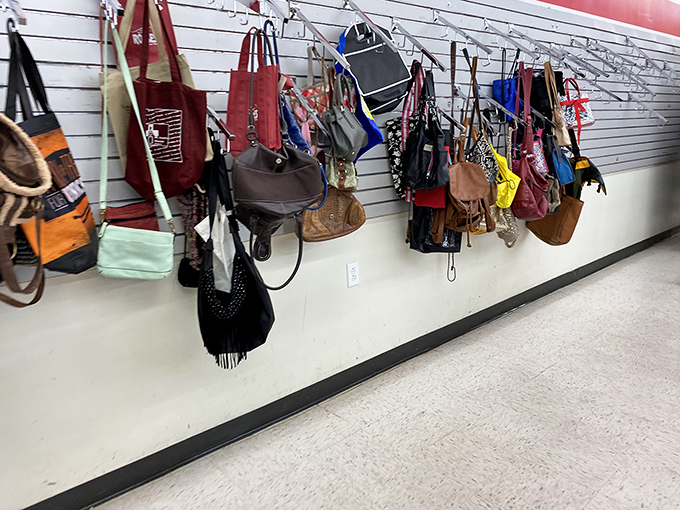 The handbag wall&mdash;where yesterday's splurges become today's steals. Each purse carries not just your stuff but stories from its previous adventures.
