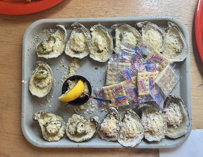 Baked oysters arrive like little boats of joy, their shells cradling buttery, seasoned treasures. The perfect marriage of ocean and oven.