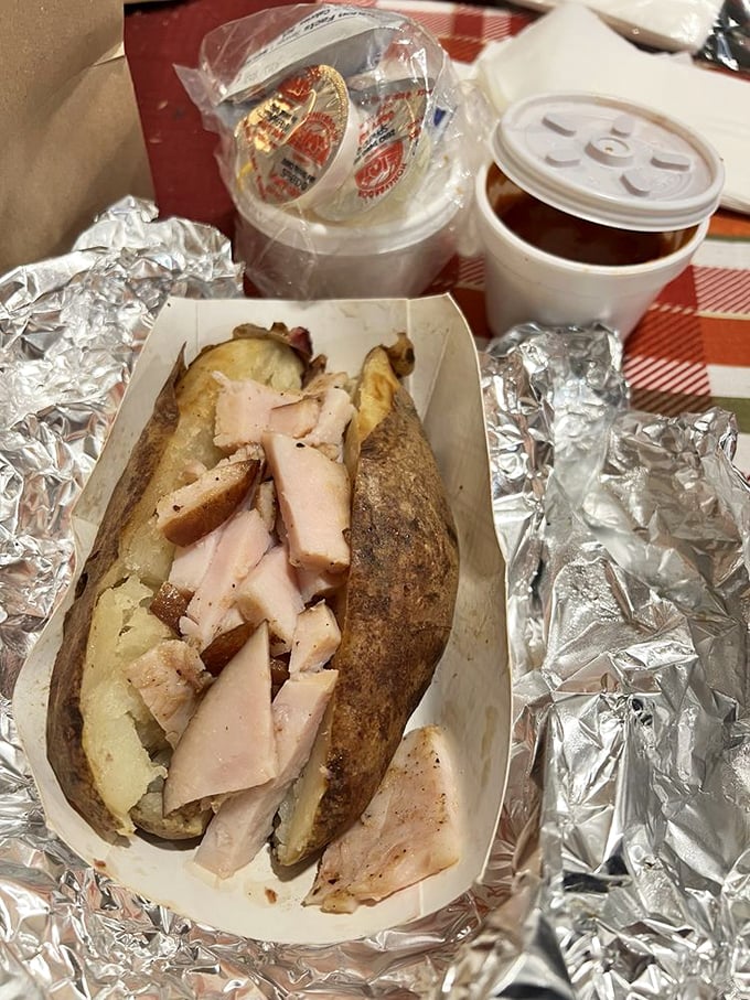 That moment when a humble baked potato becomes the perfect vehicle for smoky turkey&mdash;proof that in Texas, even the sides get the star treatment.