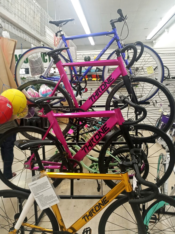 Pedal your way to bargain bliss! These vibrant Throne bikes in candy-colored frames await their next adventure through Riverside County streets.