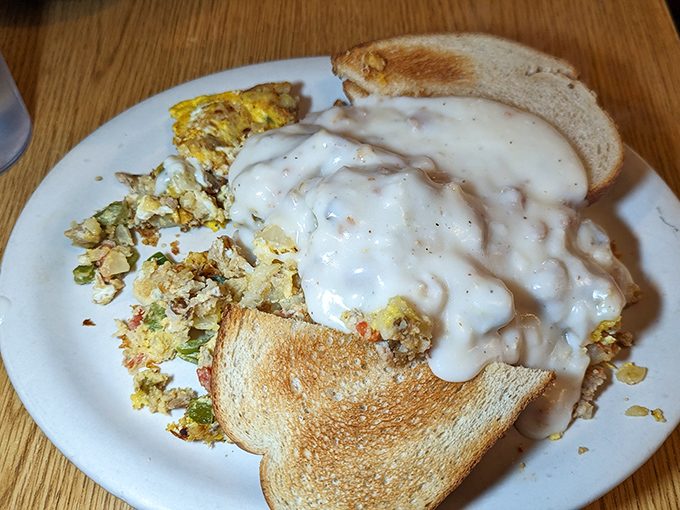 Biscuits and gravy that would make your grandmother both proud and jealous. That creamy blanket of sausage gravy doesn't just cover&mdash;it embraces.
